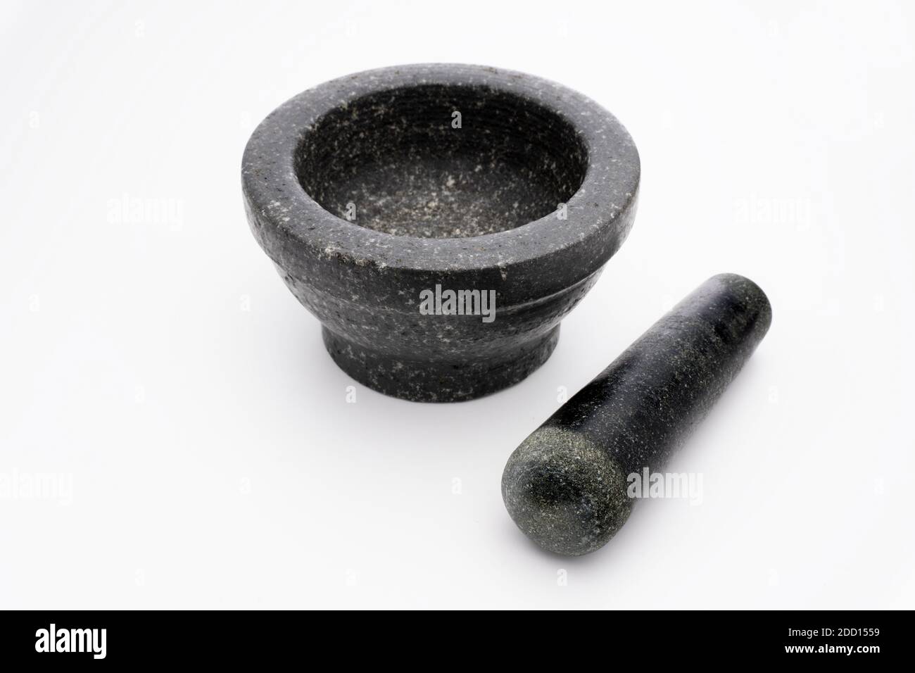 Kitchen mortar on white background Stock Photo - Alamy