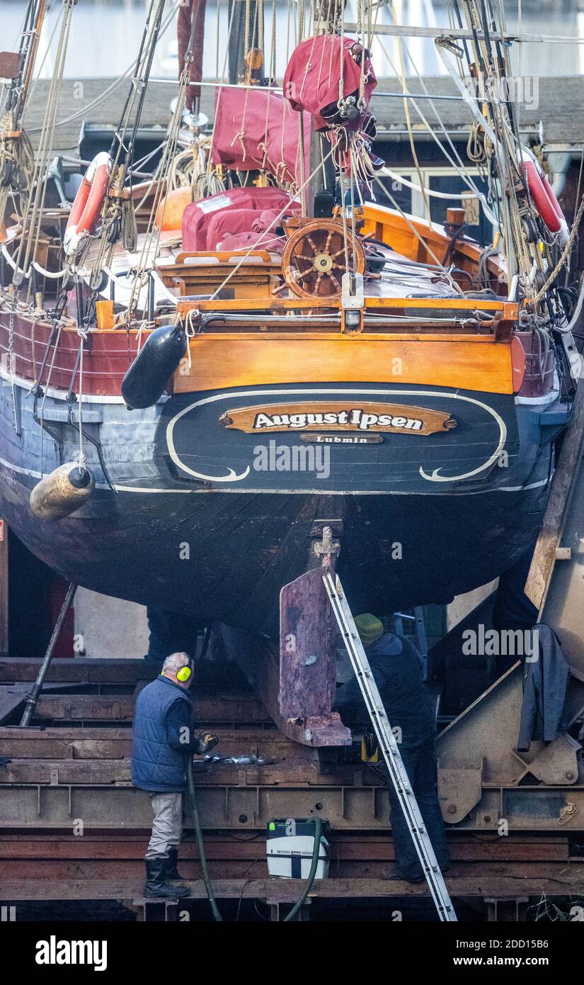 Greifswald, Germany. 23rd Nov, 2020. Men work at the museum shipyard on ...