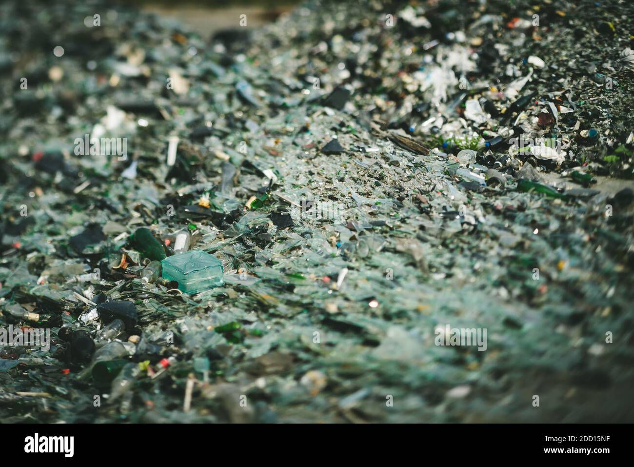 Close-up of broken glass and mirrors on dump. Environmental pollution ...