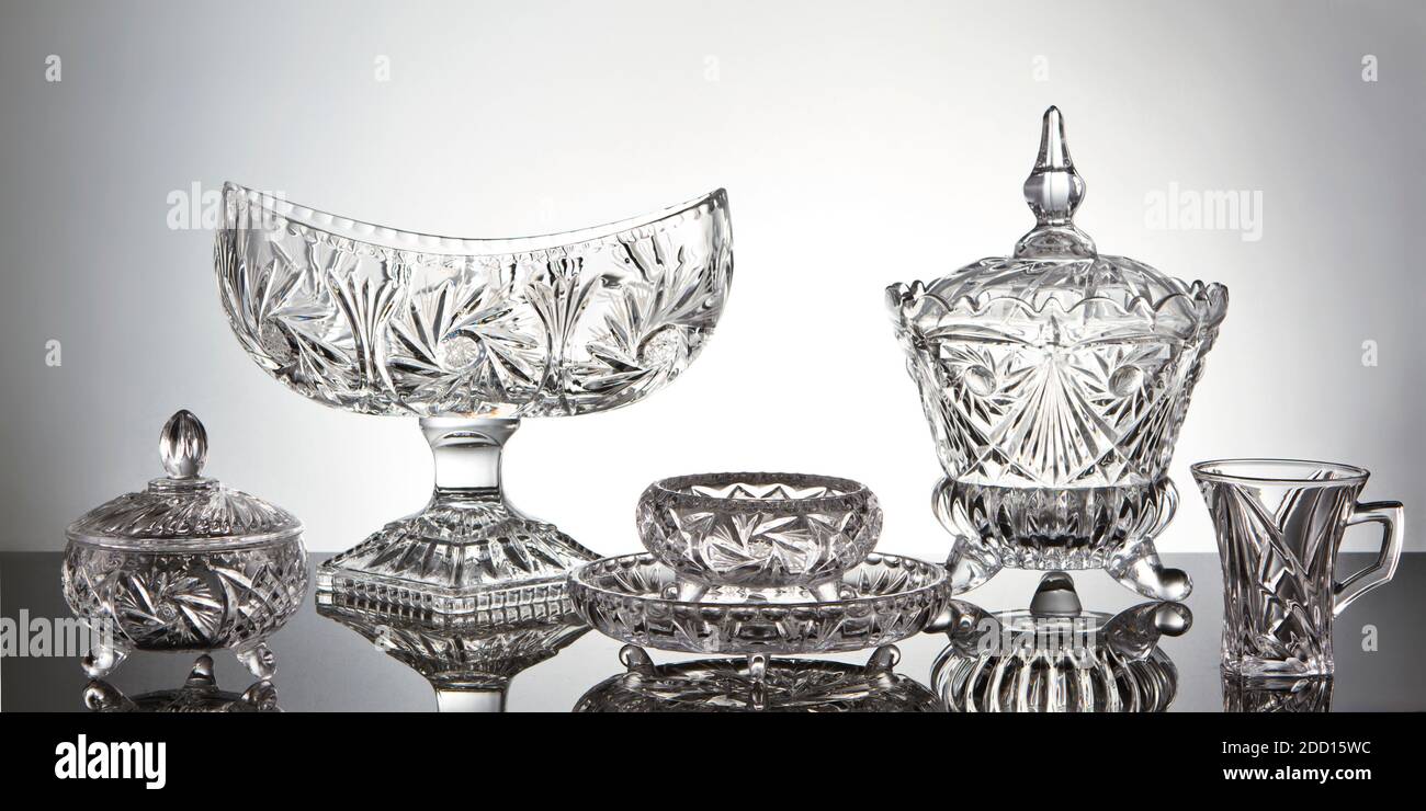 elegant crystal container on a black background Stock Photo - Alamy
