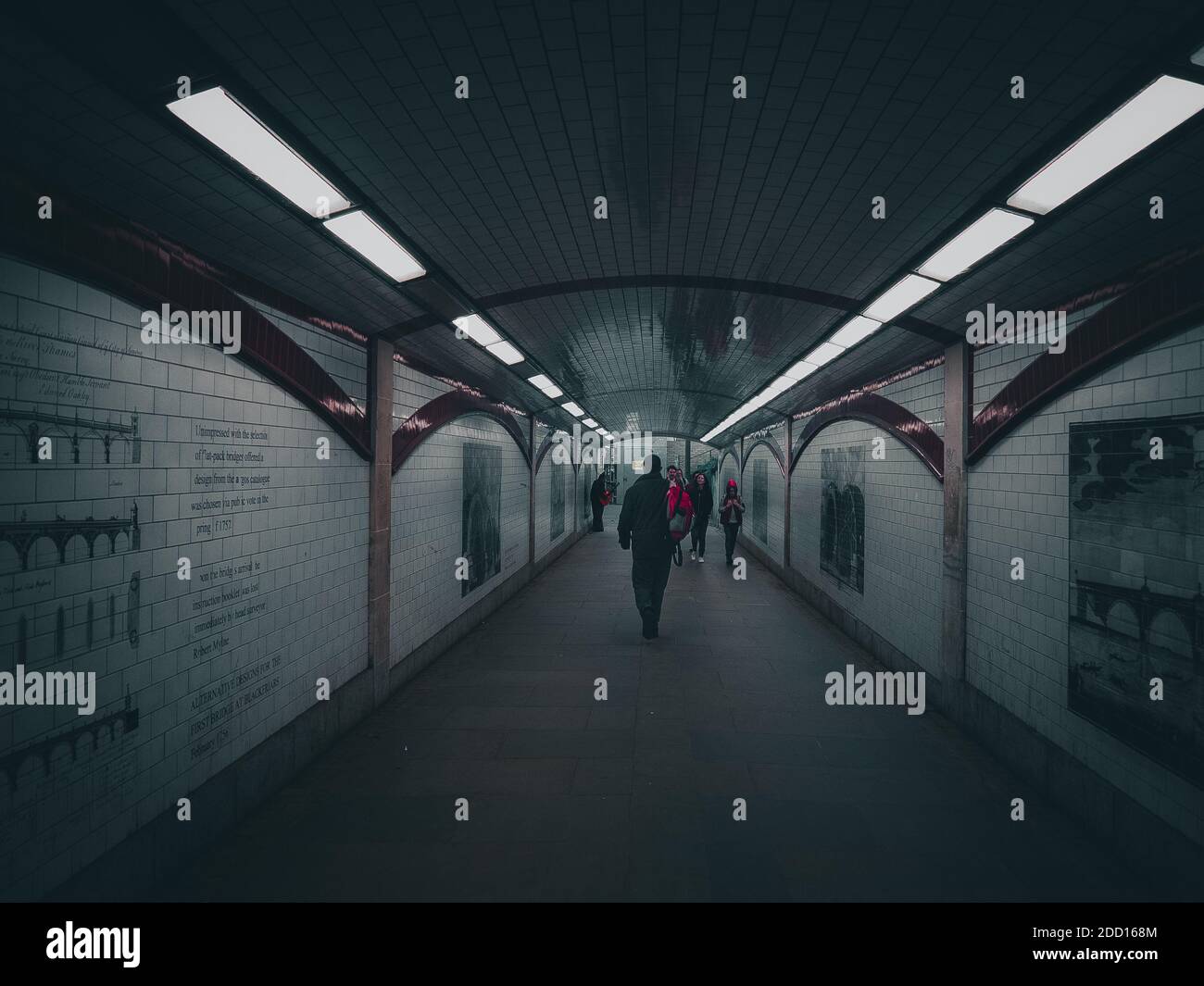 Walking Under Bridge Stock Photo - Alamy