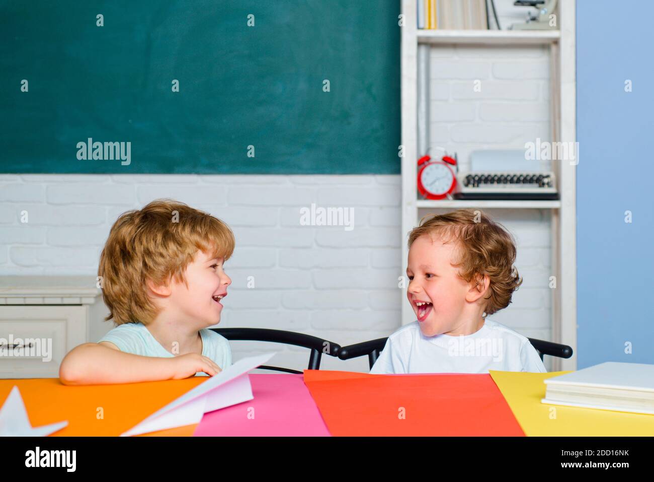 Happy cute clever boy pupil with book. Kid with a book. Child is ready ...