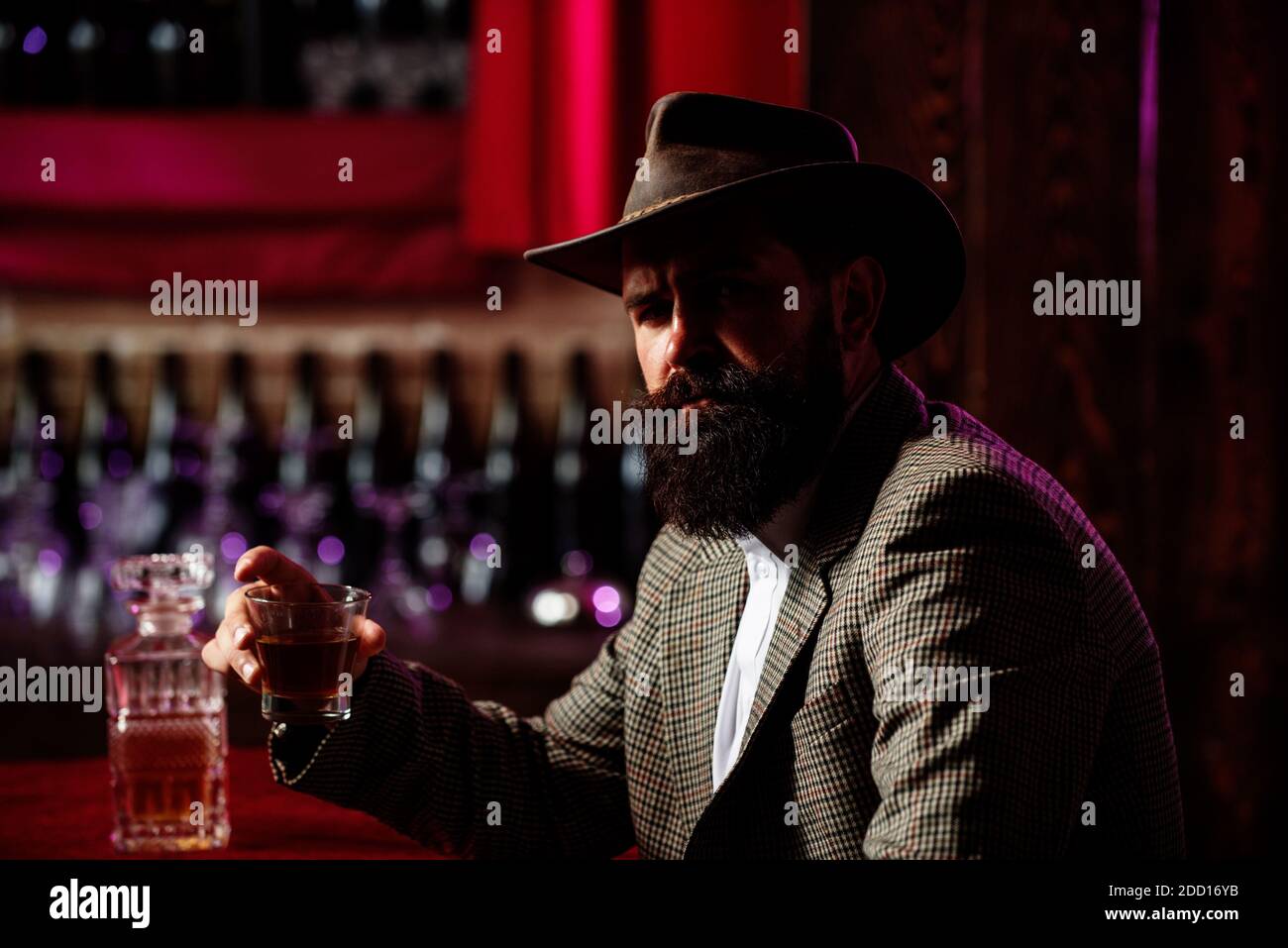 Portrait of beard man with beard. Macho drinking. Stylish rich man ...