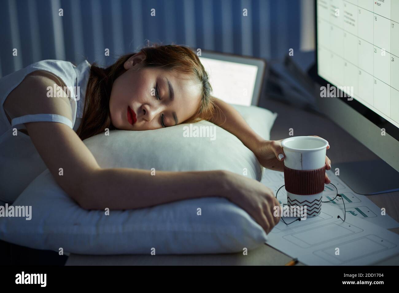 Tired office worker Stock Photo - Alamy