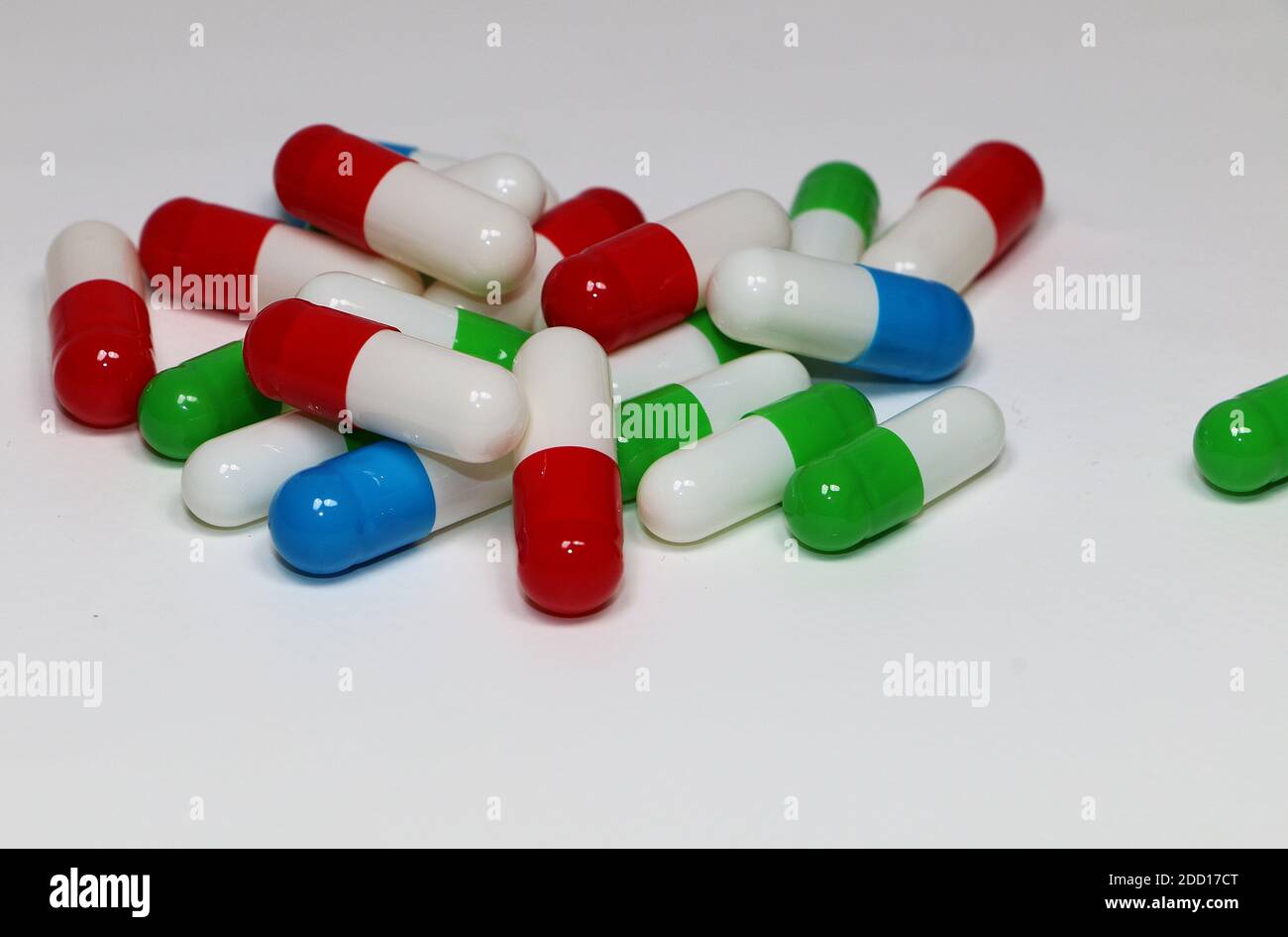 A closeup shot of capsule medications on a white background Stock Photo ...