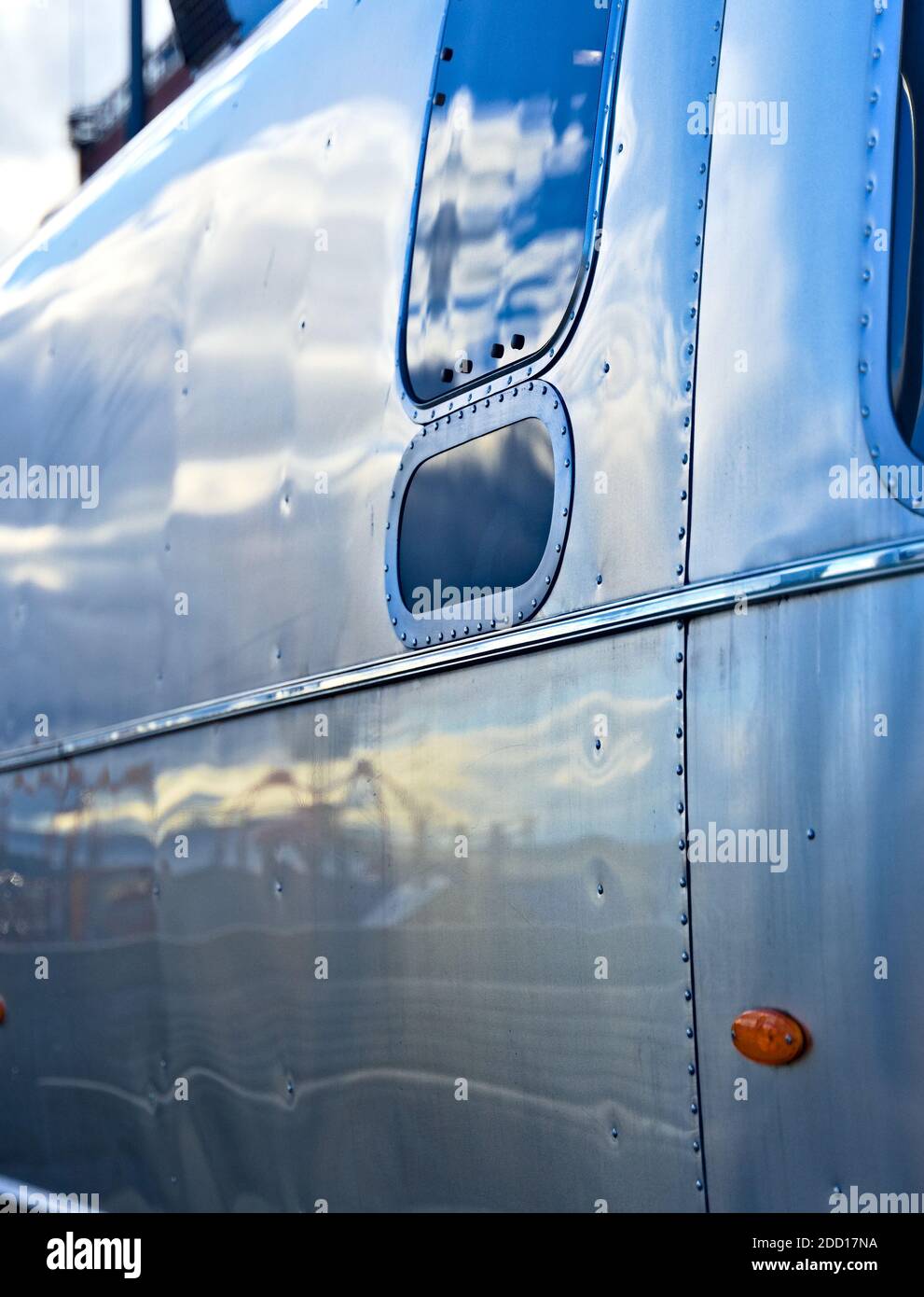 Classic American aluminum camper from the side Stock Photo - Alamy