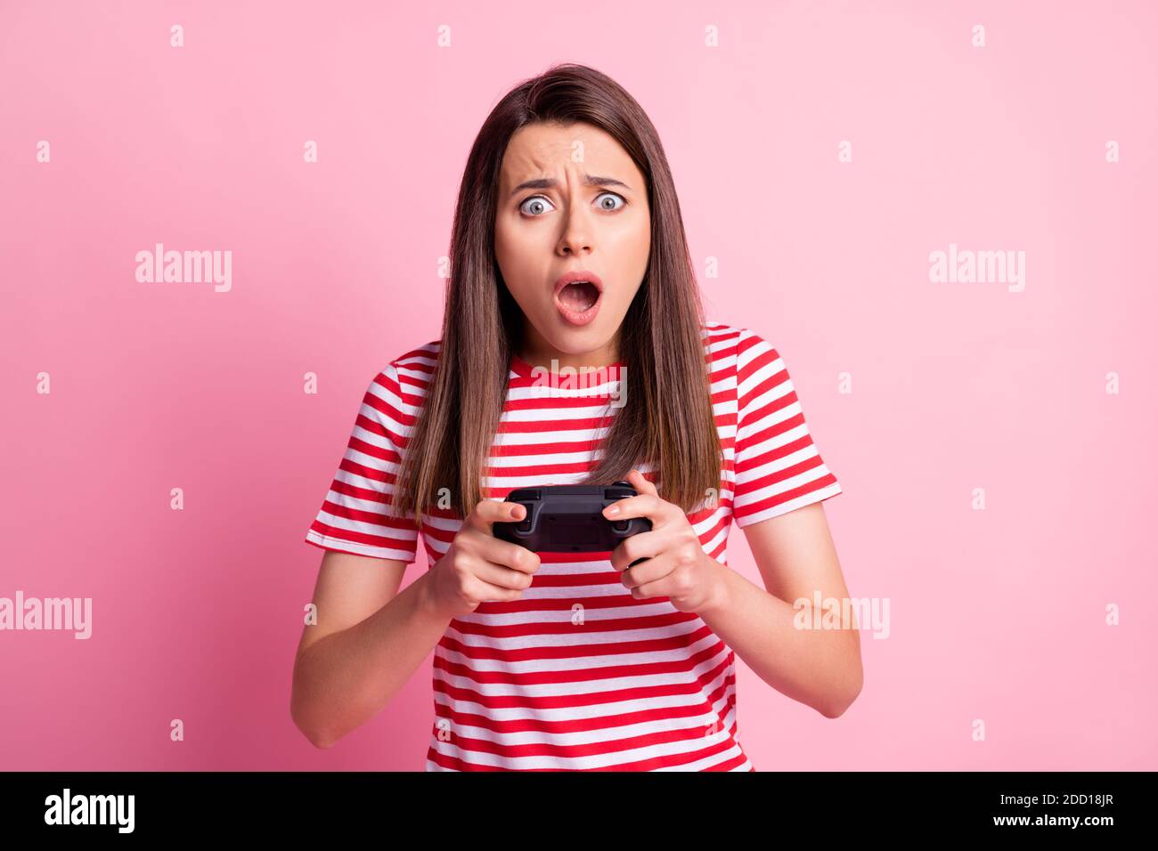Photo portrait of upset girl losing the game playing with controller ...