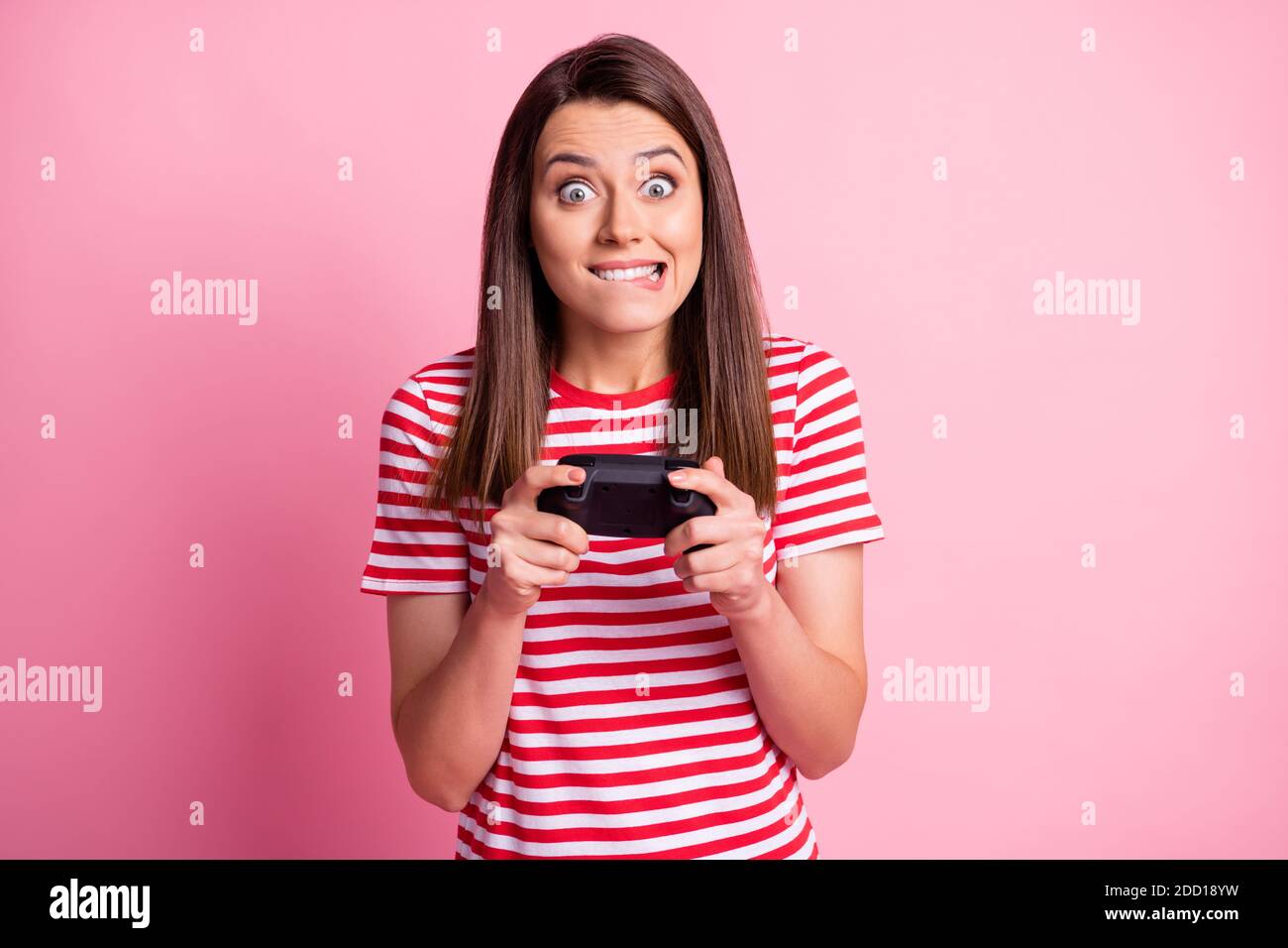 Photo portrait of crazy girl playing video game keeping controller ...