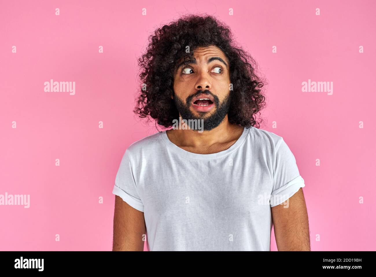 young arab man is shocked, show surprise and amazed expression ...