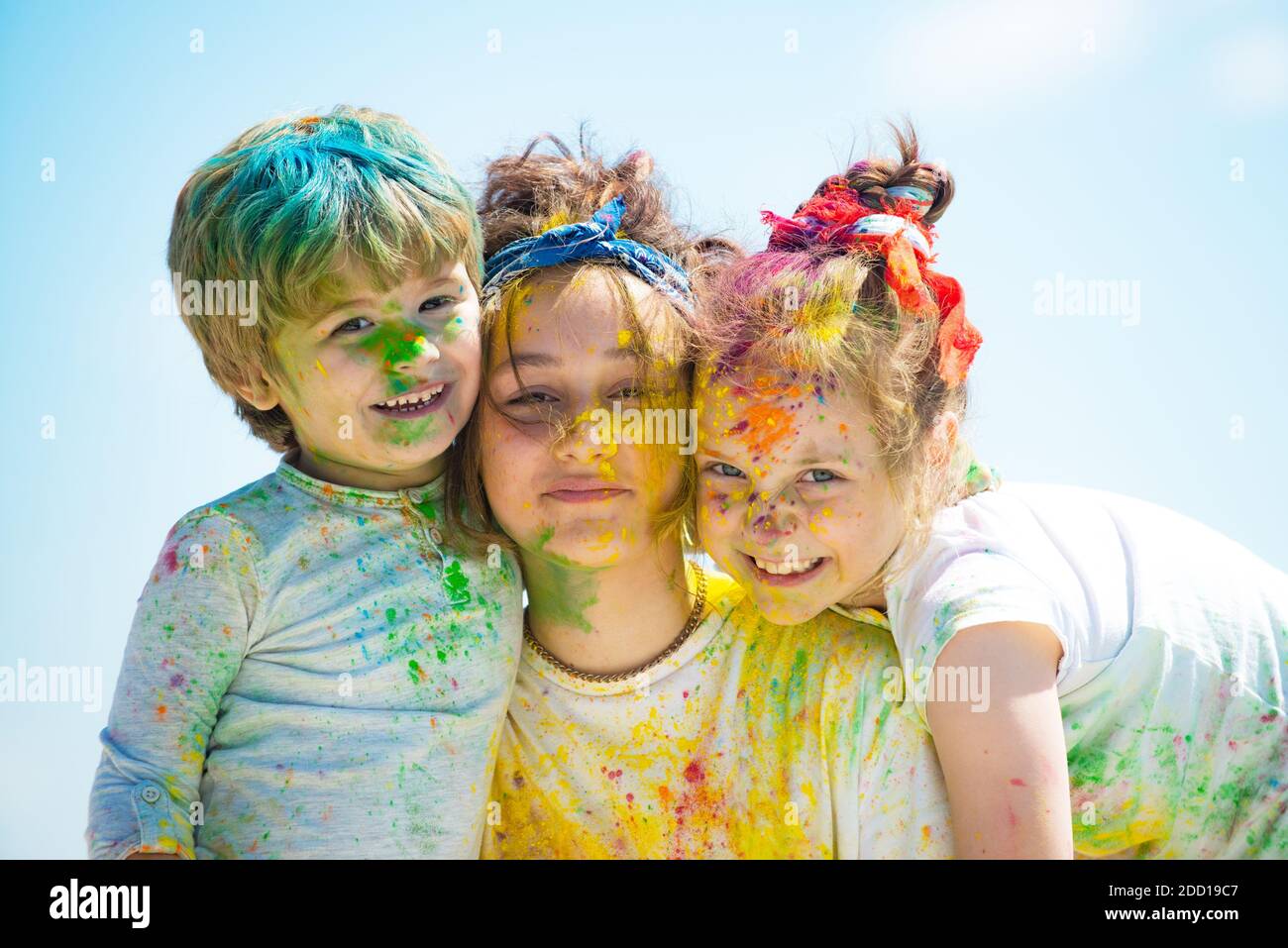 Portrait of a happy laughing children. Smiling kids with face art ...