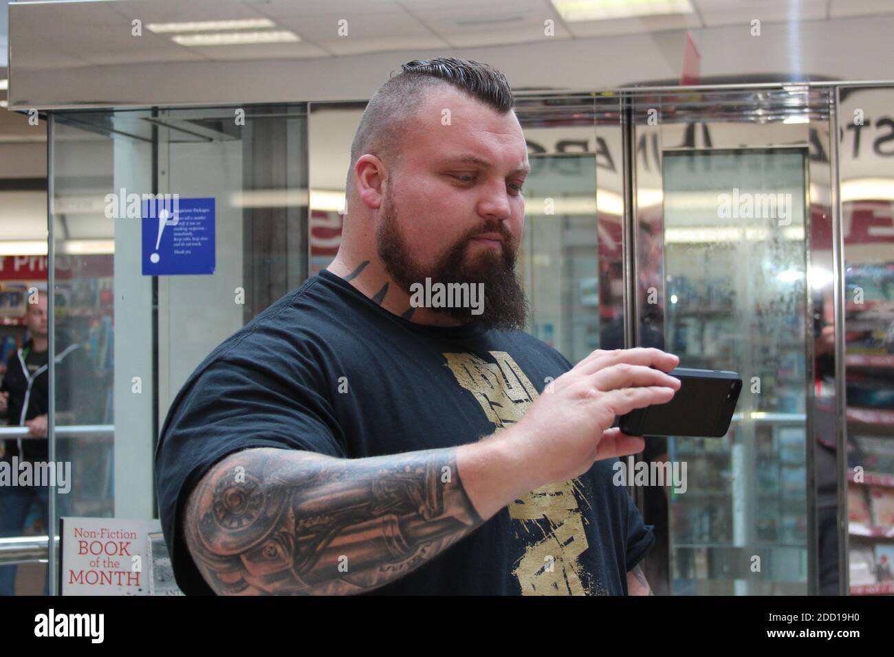 Eddie Hall the strongmen, WH Smith Chester. signing copes of his book ...