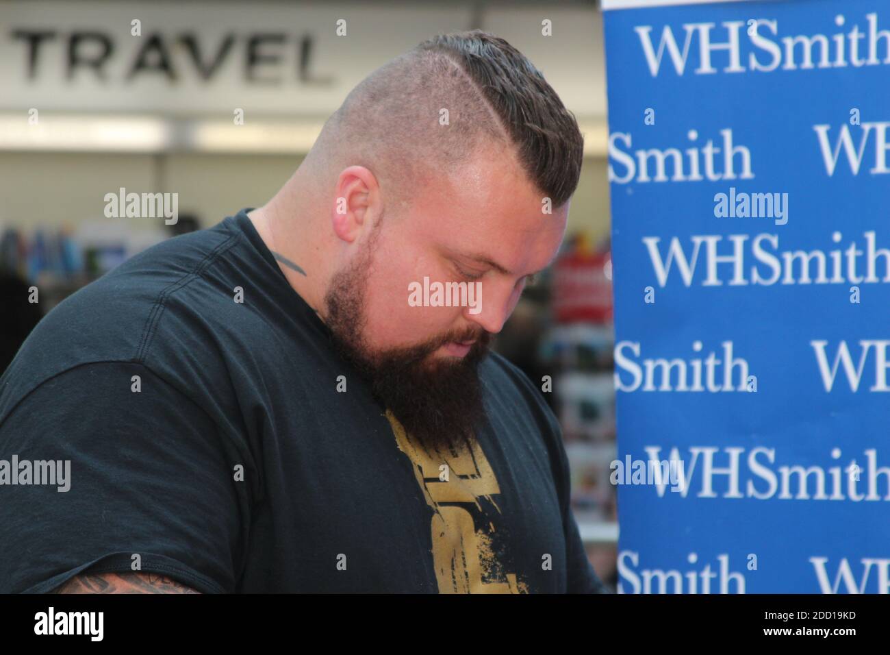 Eddie Hall the strongmen, WH Smith Chester. signing copes of his book ...