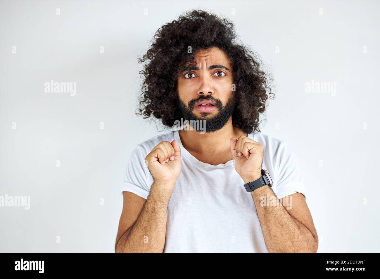 scared frightened male look at camera, guy of arabic appearance in ...