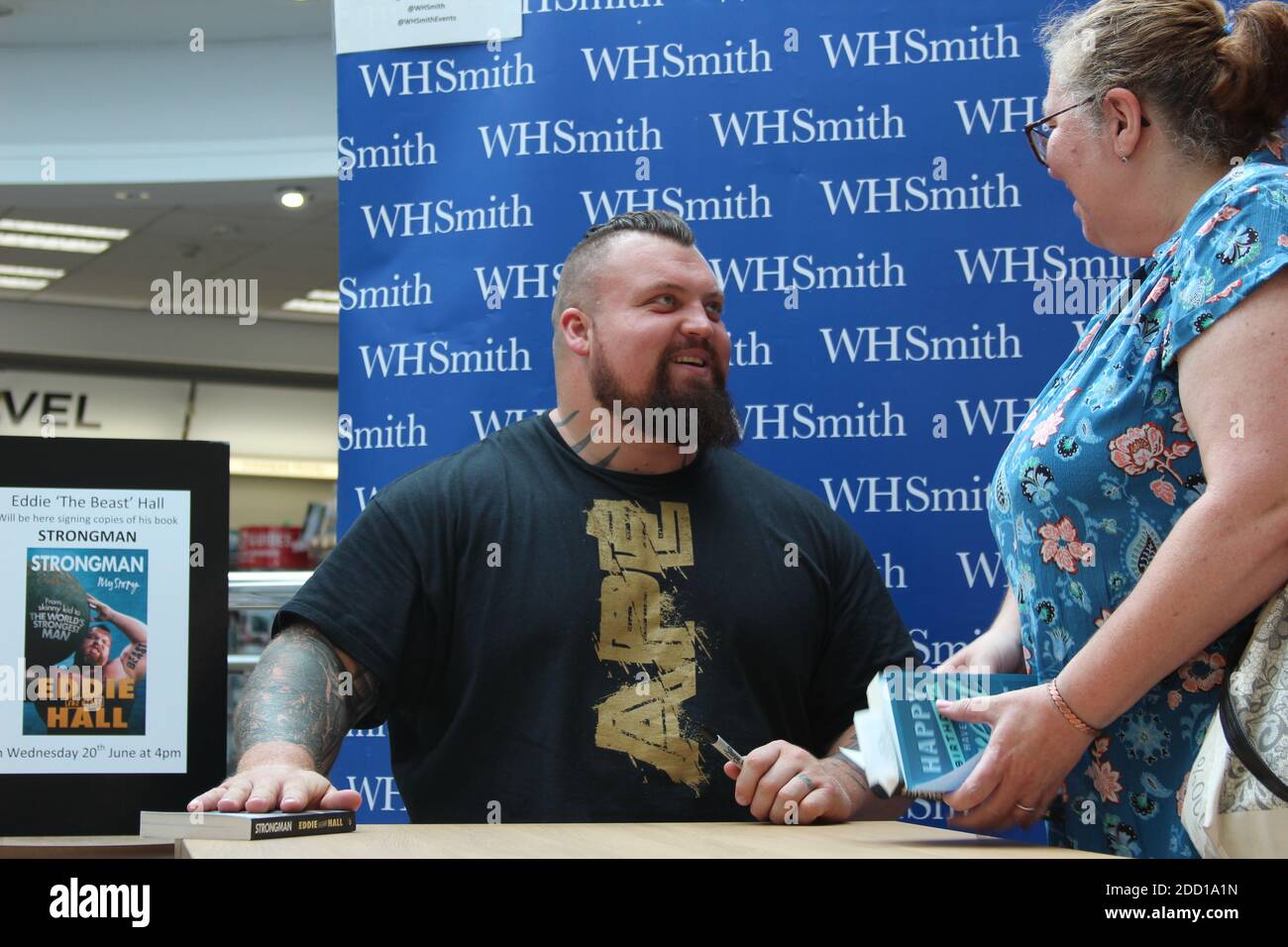 Eddie Hall the strongmen, WH Smith Chester. signing copes of his book ...