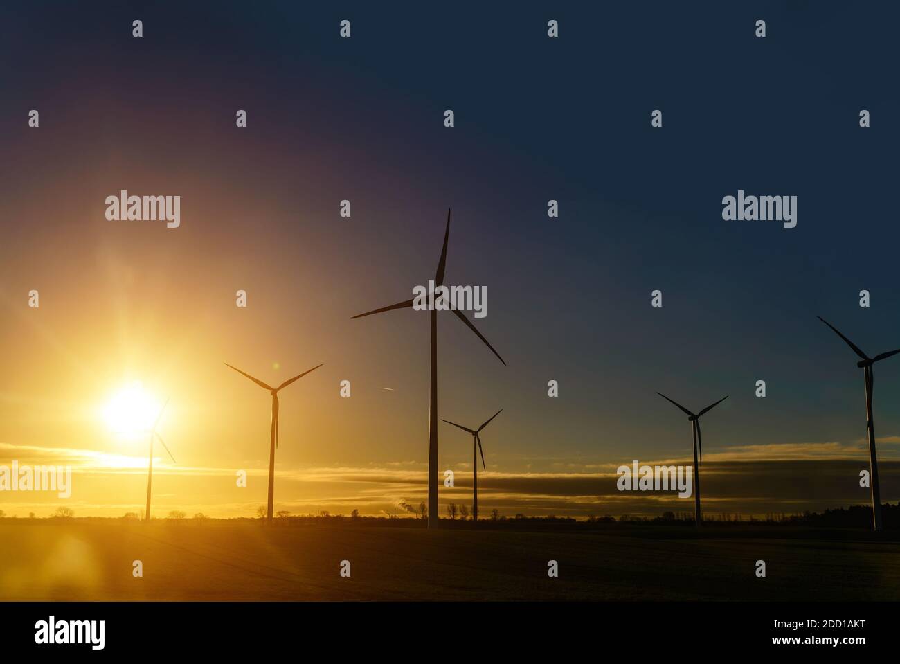 Wind power plants in sunlight. Toning Stock Photo - Alamy