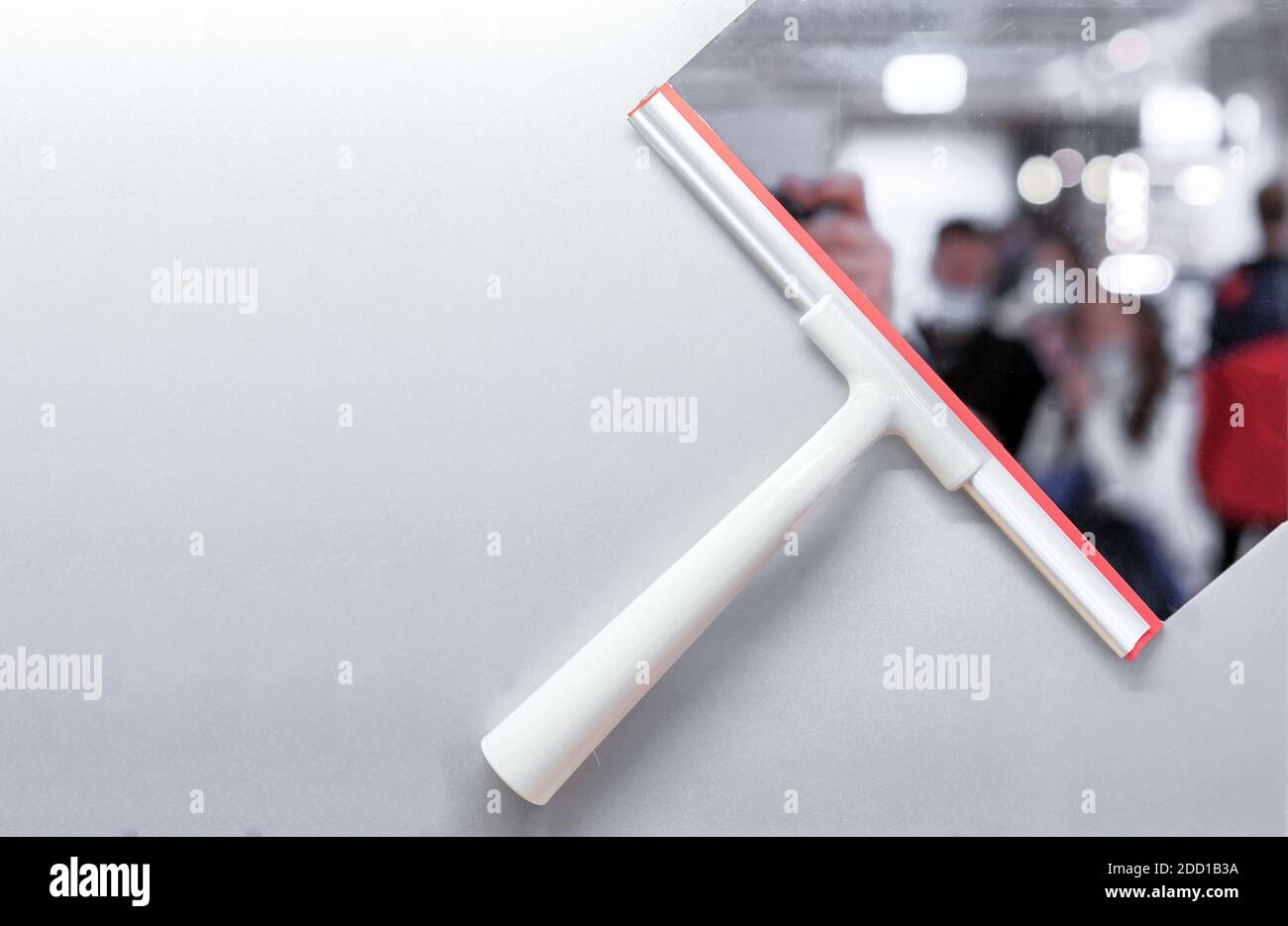 Brush with rubber attachment for cleaning mirrors and glass Stock Photo ...