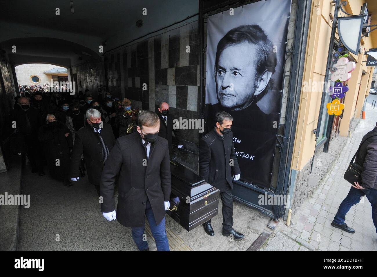 People carry a coffin of theater director, Roman Viktyuk during a ...