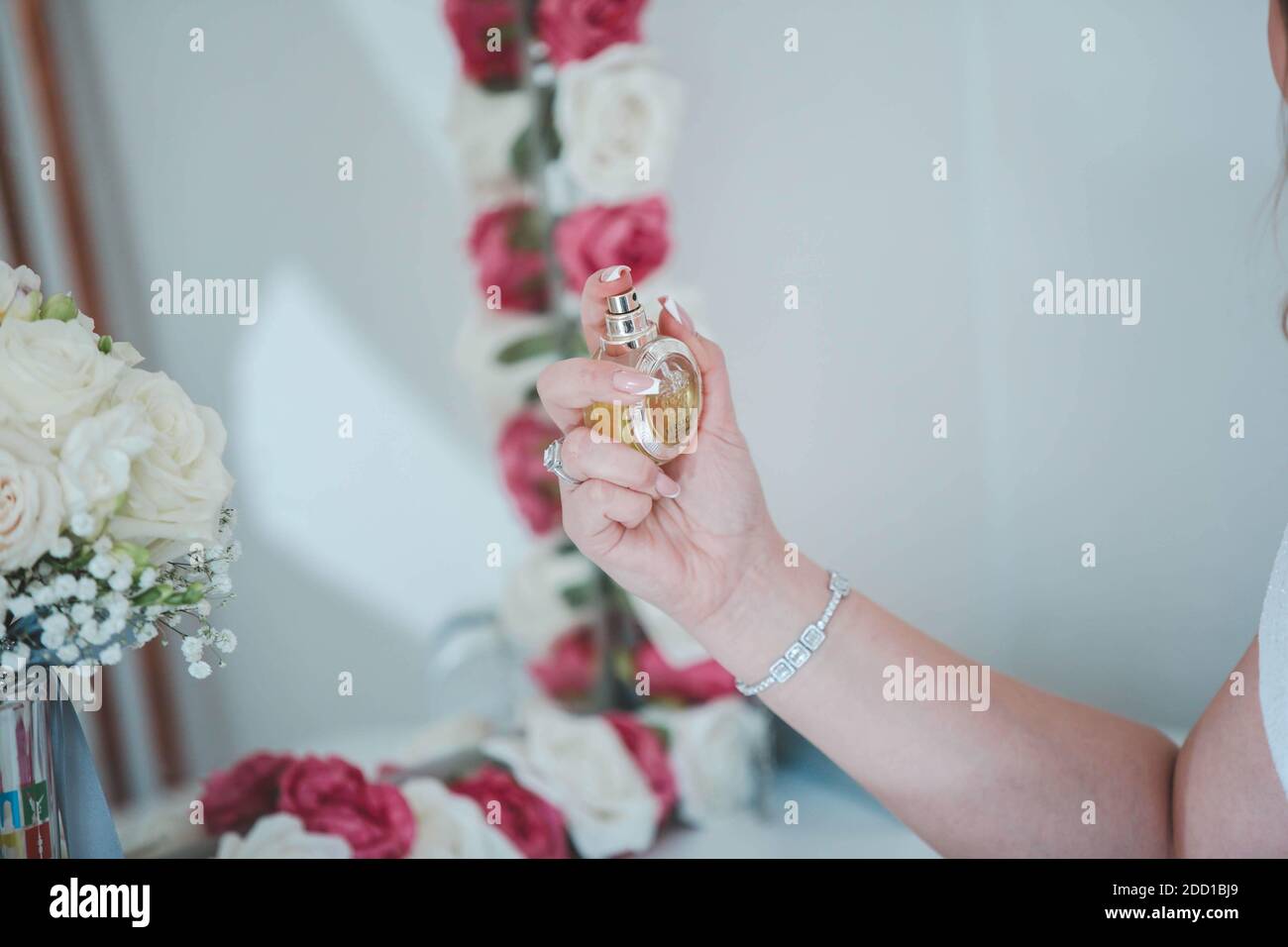Spraying perfume man woman hi-res stock photography and images - Alamy