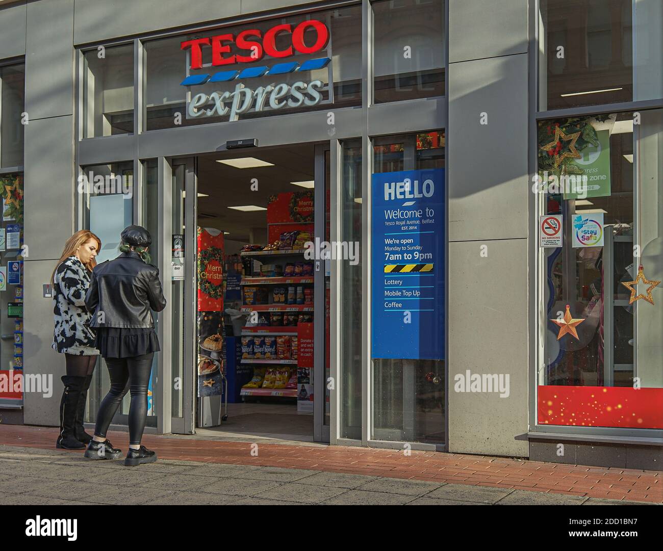 Customers are seen entering Tesco Express Store Stock Photo - Alamy