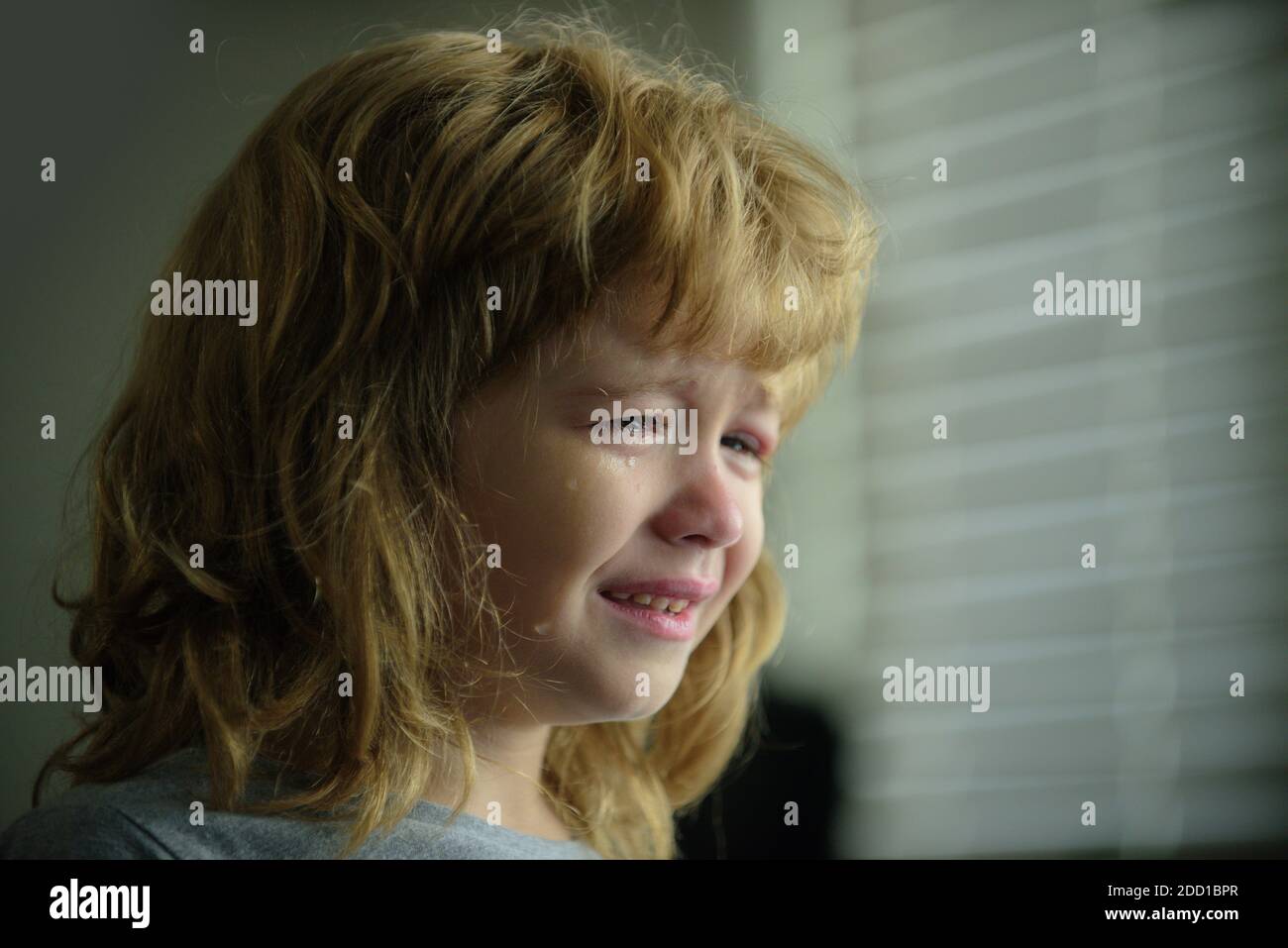 Crying kid boy. Sad Child with tears at Home Stock Photo - Alamy