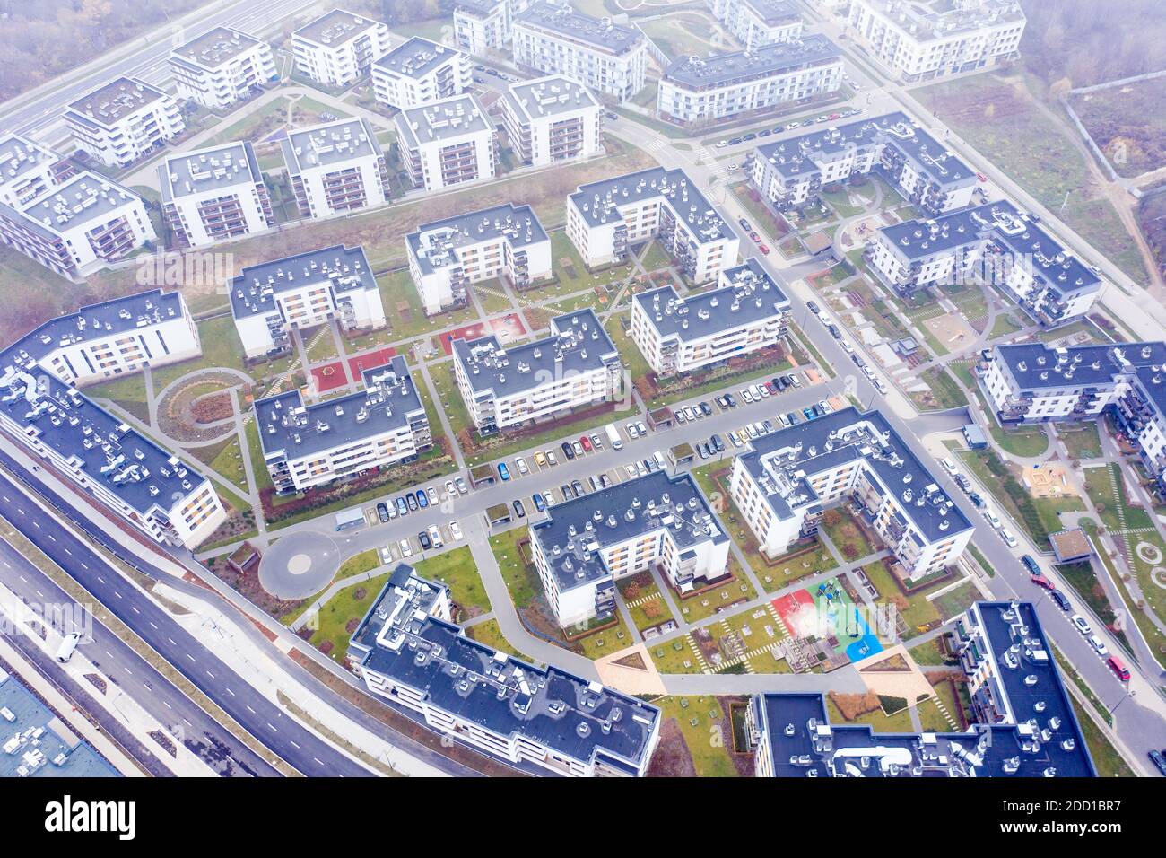 Urban texture and pattern. Aerial view of the city buildings under a ...