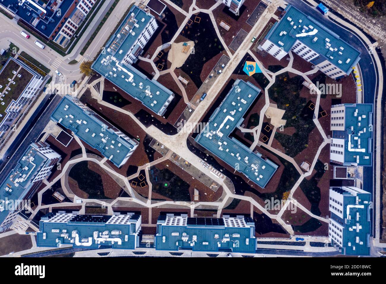 Urban texture and pattern. Aerial view of the city buildings under a ...