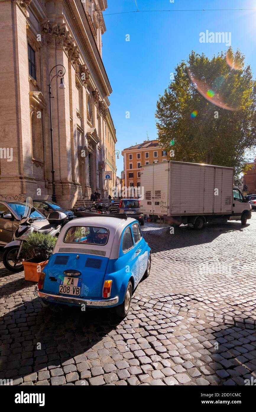 A Blue Small Italian Car in a Cobblestone Street - Rome, Italy Stock ...