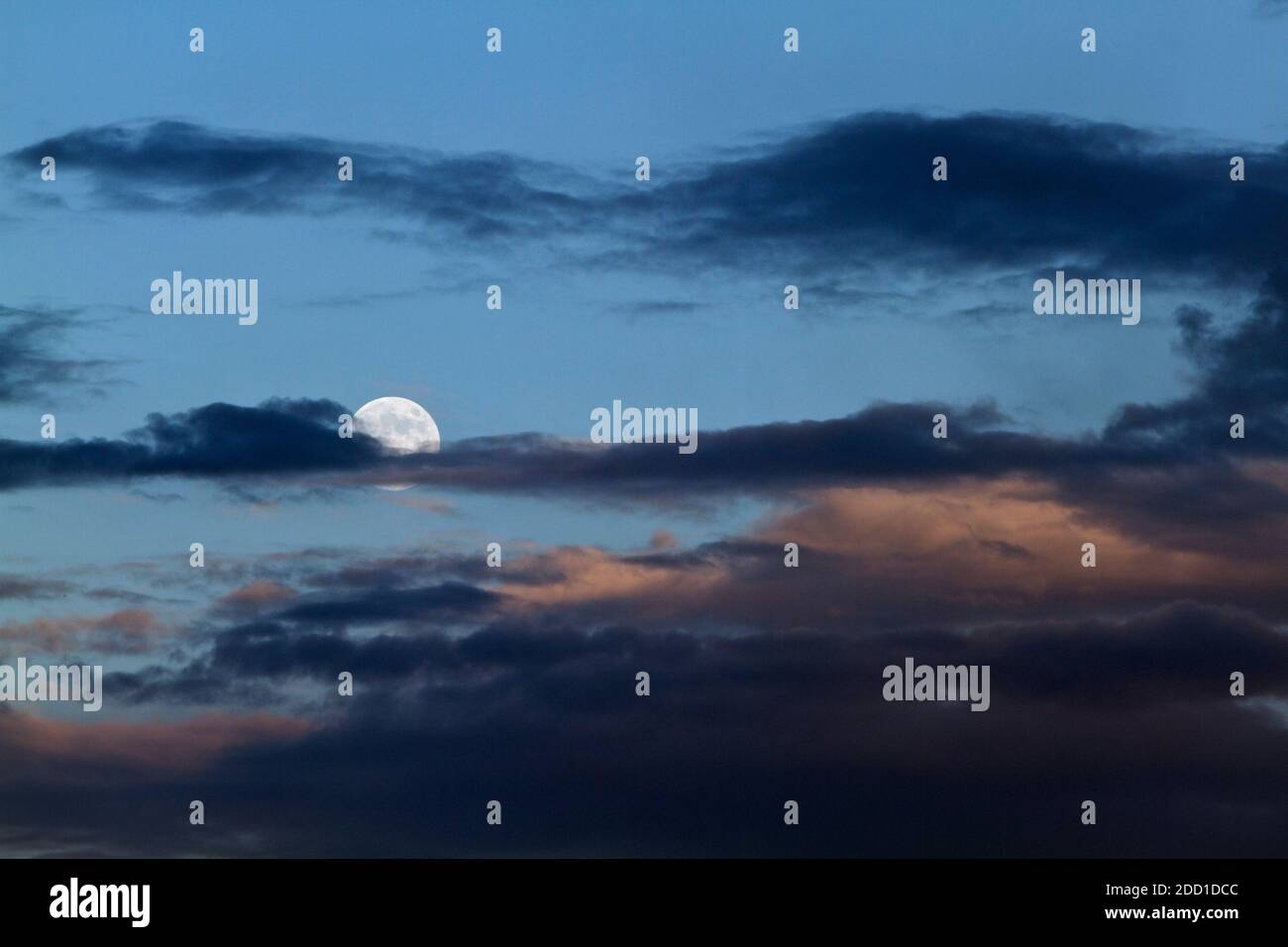 Moon behind cloud hi-res stock photography and images - Alamy