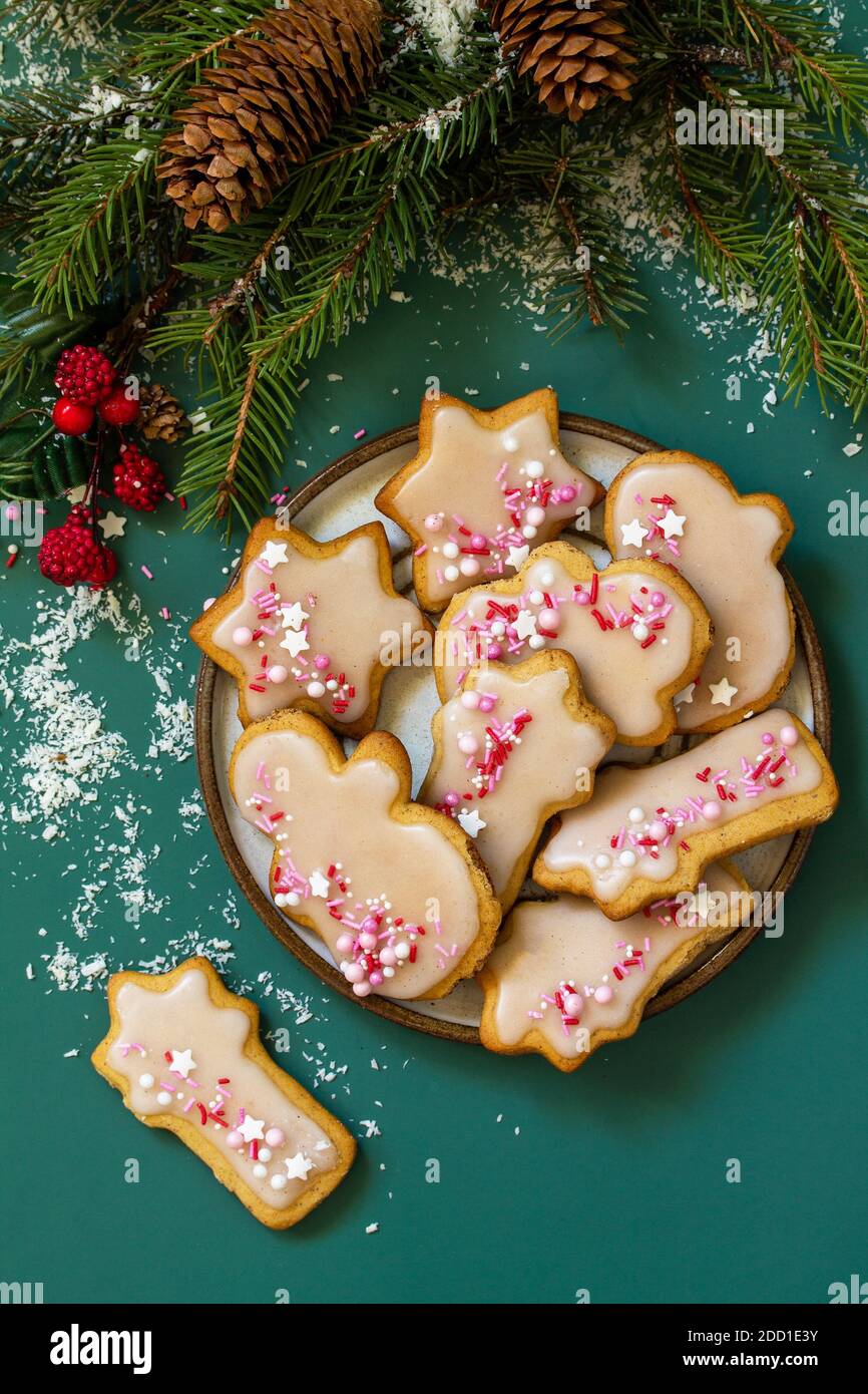Christmas baking. Homemade gingerbread cookies with glaze on the ...