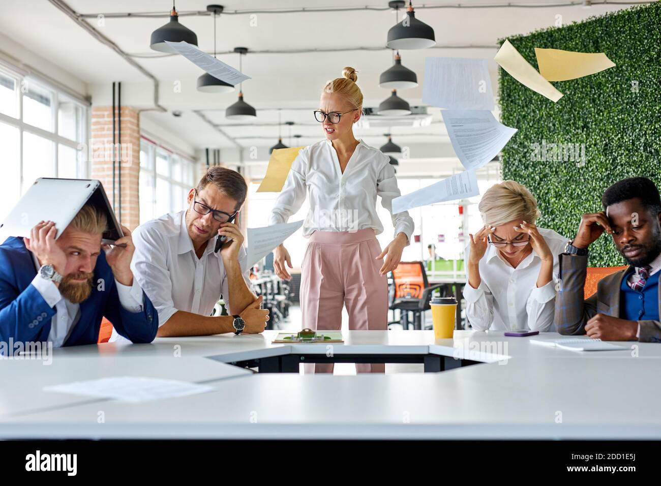 rude angry female boss executive is dissatisfied irritated by employees ...