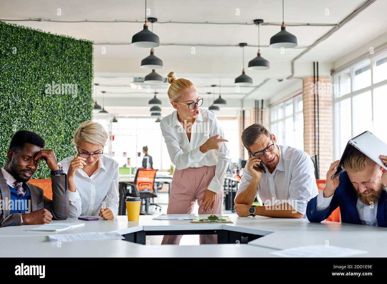 rude angry female boss executive is dissatisfied irritated by employees ...