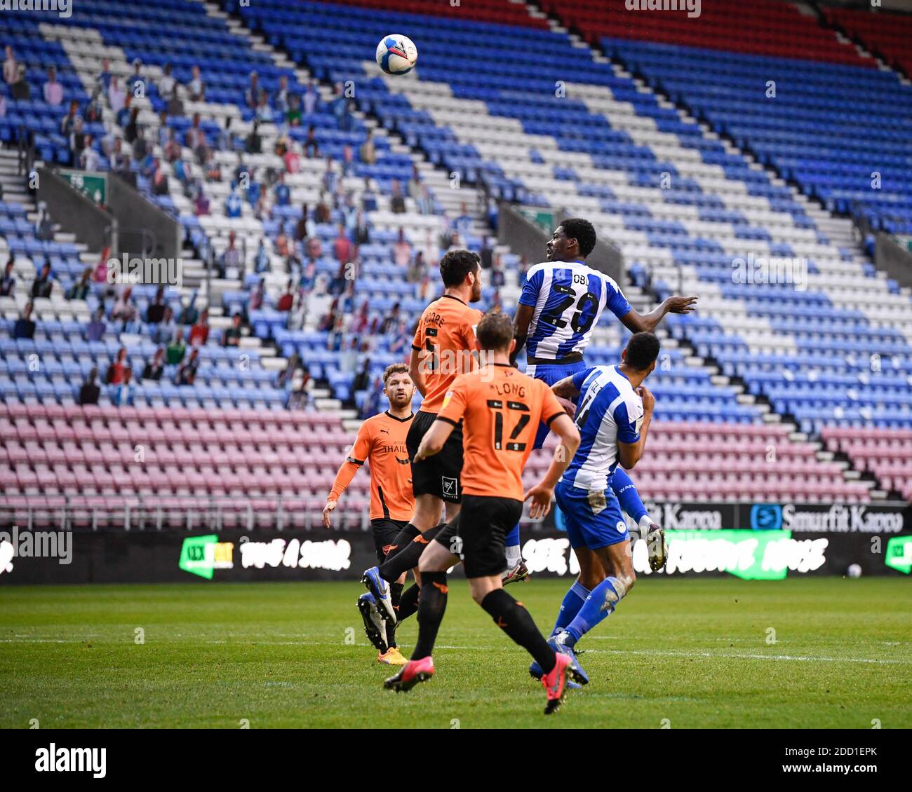 Emeka Obi #20 of Wigan Athletic heads the ball over the bar Stock Photo ...
