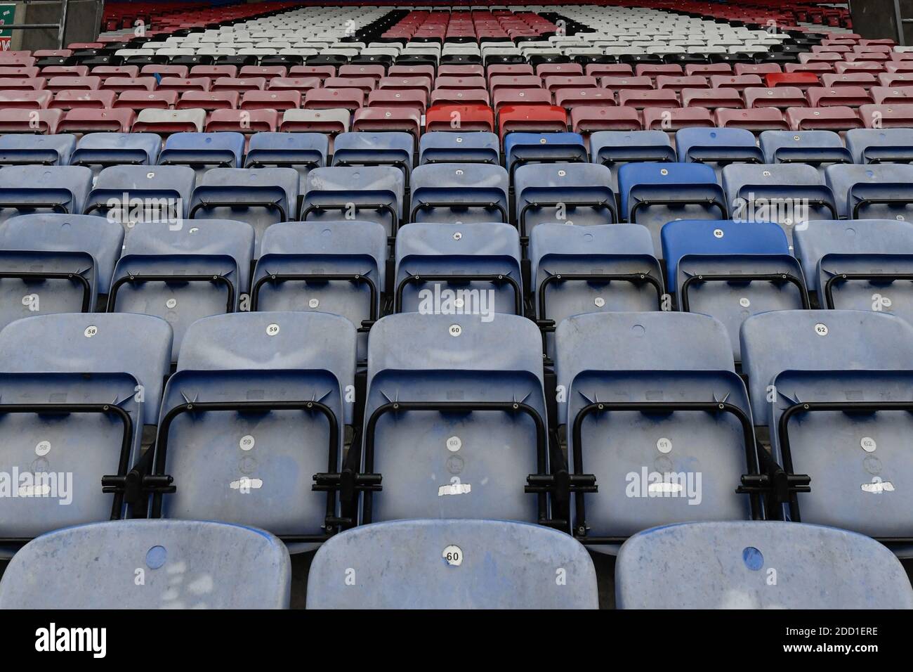 The empty seats at the DW Stadium as sports events continue to be ...