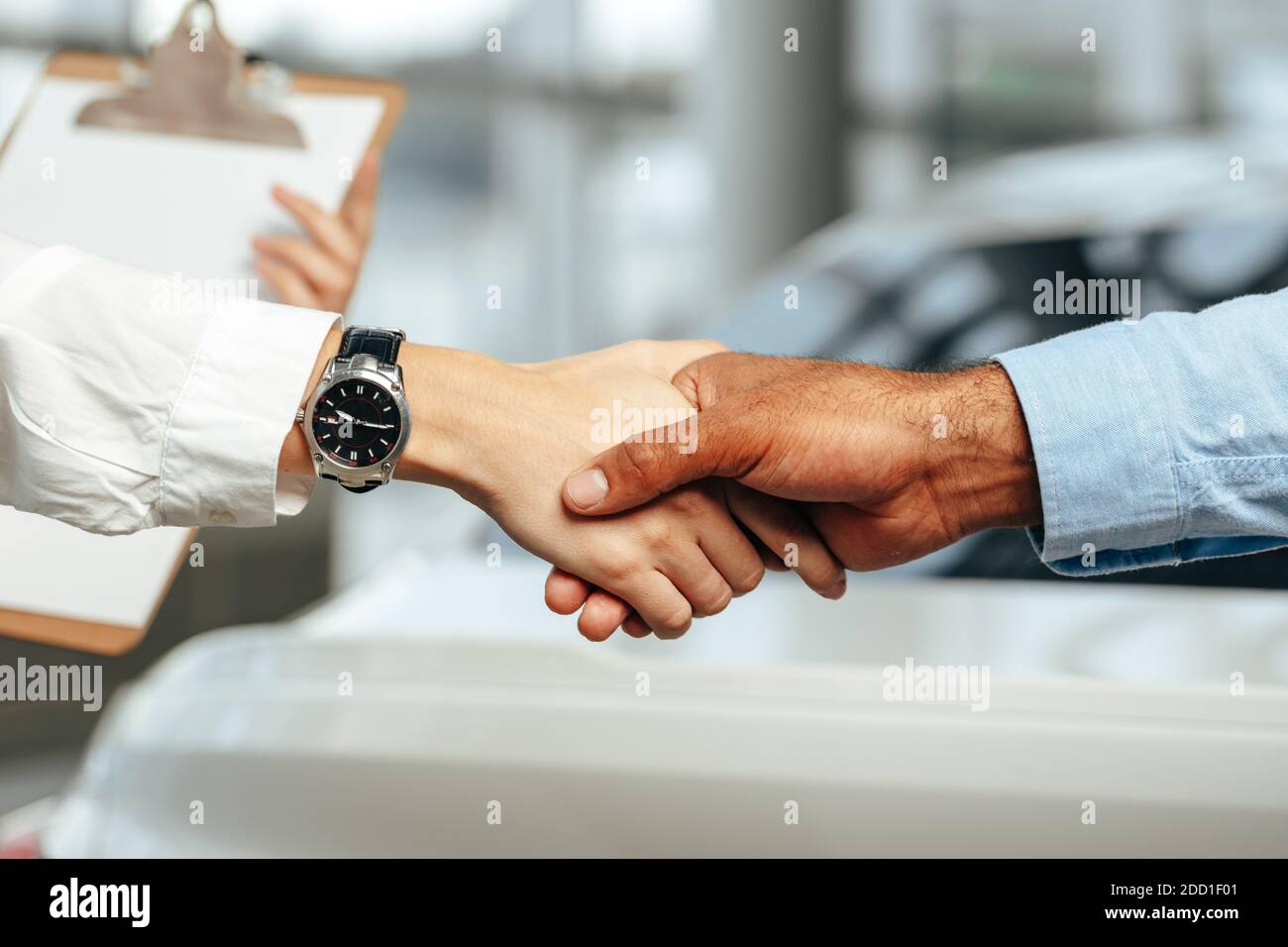 Female and male businesspeople handshake close up Stock Photo - Alamy