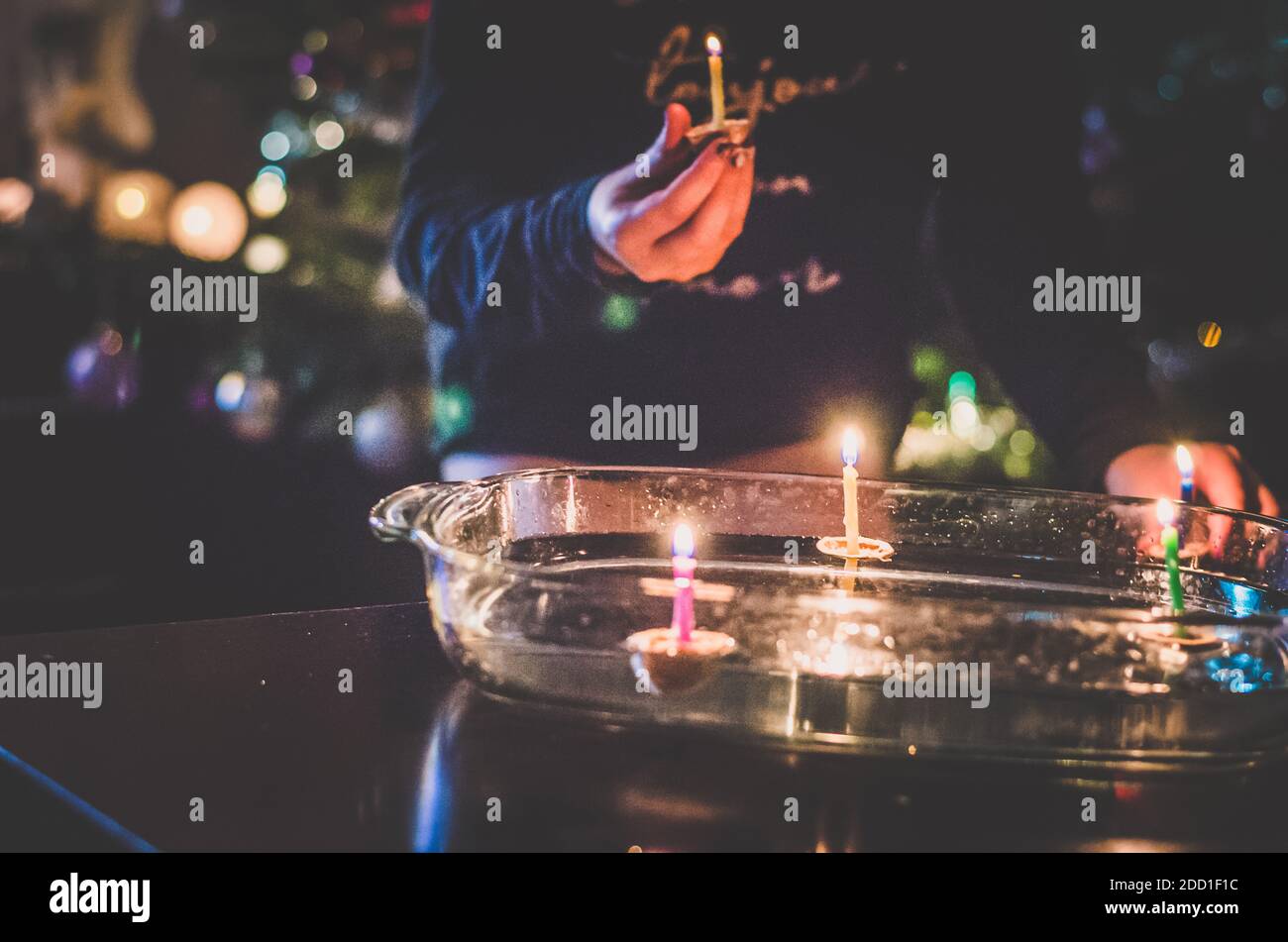 christmas tradition of nut shells floating on water surface, eastern ...
