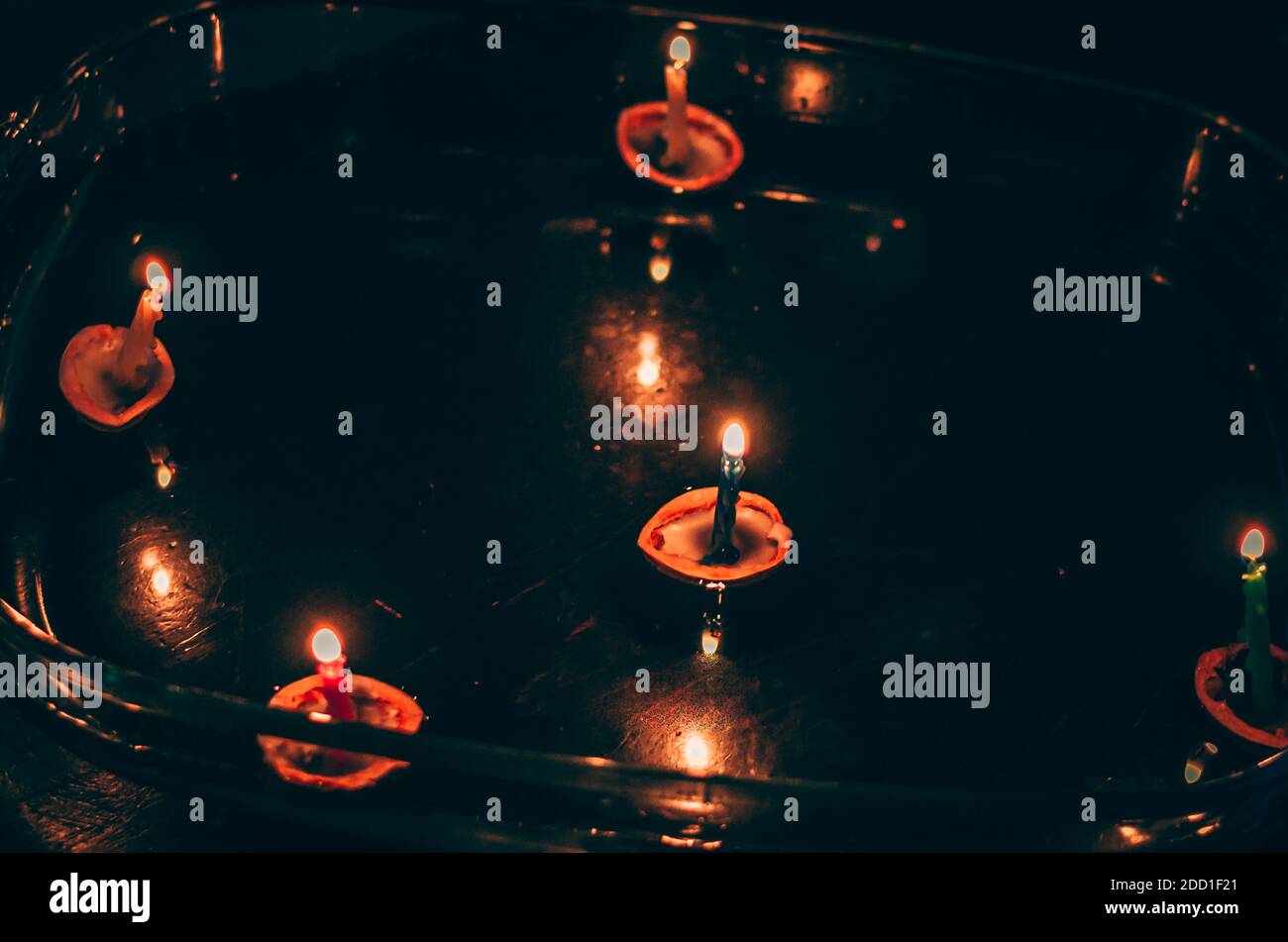 christmas tradition of nut shells floating on water surface, eastern ...