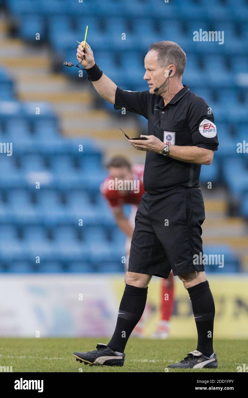 Robert Lewis (Referee) showing a yellow card Stock Photo - Alamy