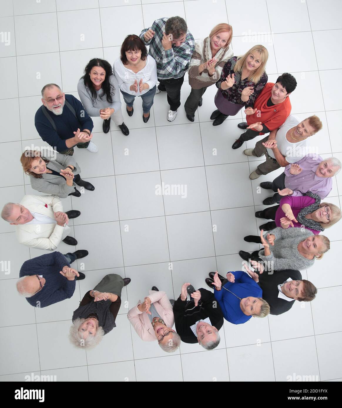 group of happy mature people applauding standing in a circle Stock ...