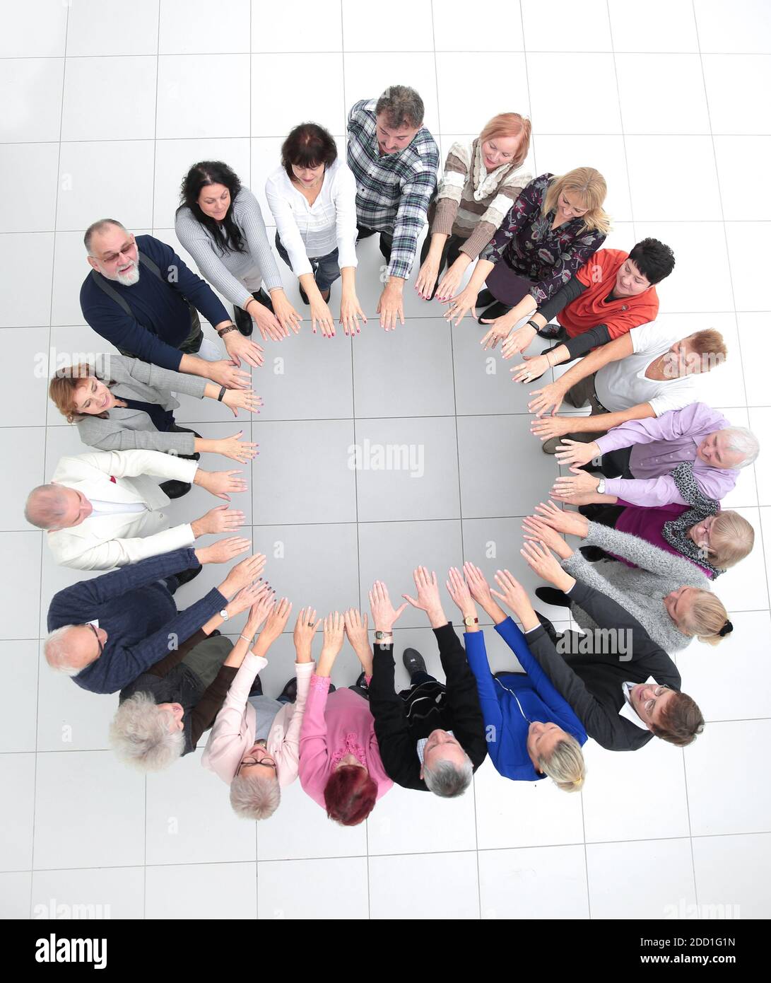 group of mature people showing their unity Stock Photo - Alamy