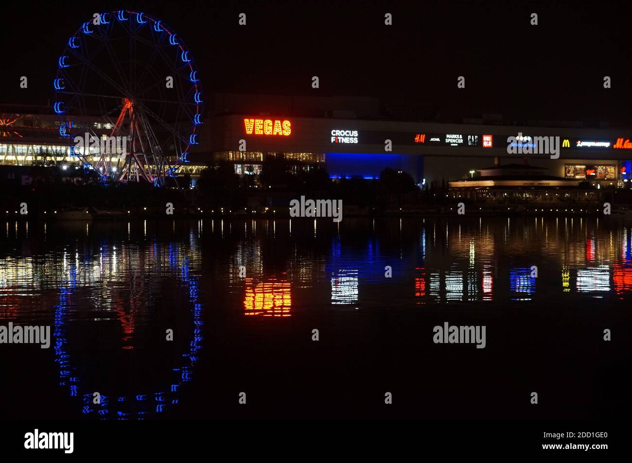 evening reflection of city lights in the water Stock Photo - Alamy