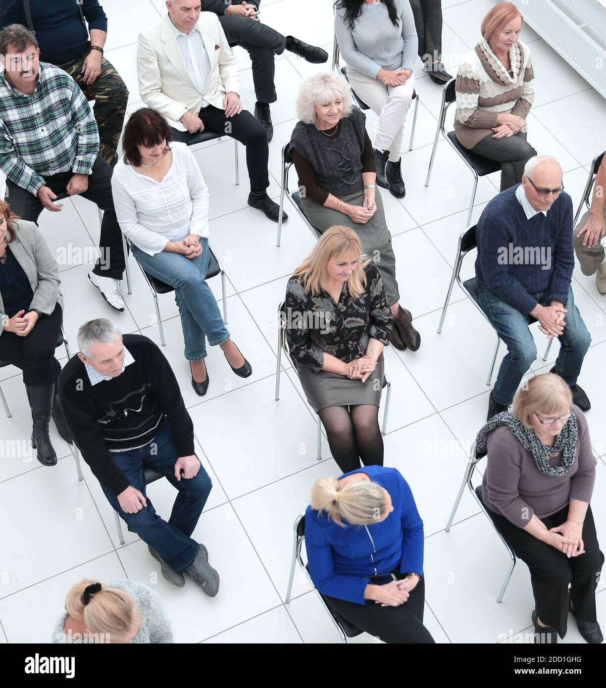 group of diverse people talking in a conference room Stock Photo - Alamy