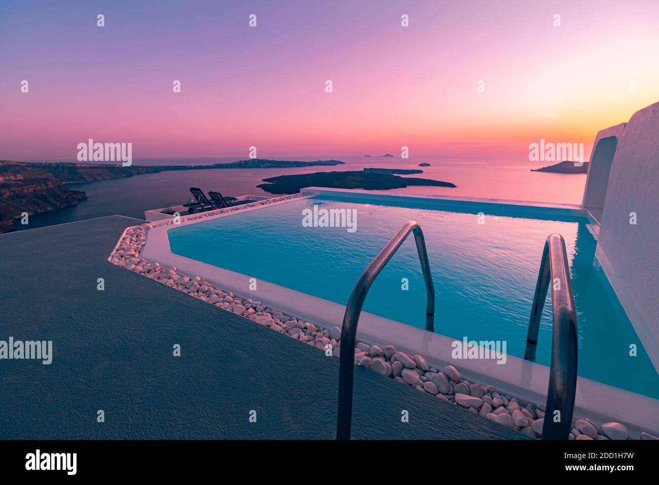 Sunset poolside vacation at Santorini, infinity swimming pool looking ...