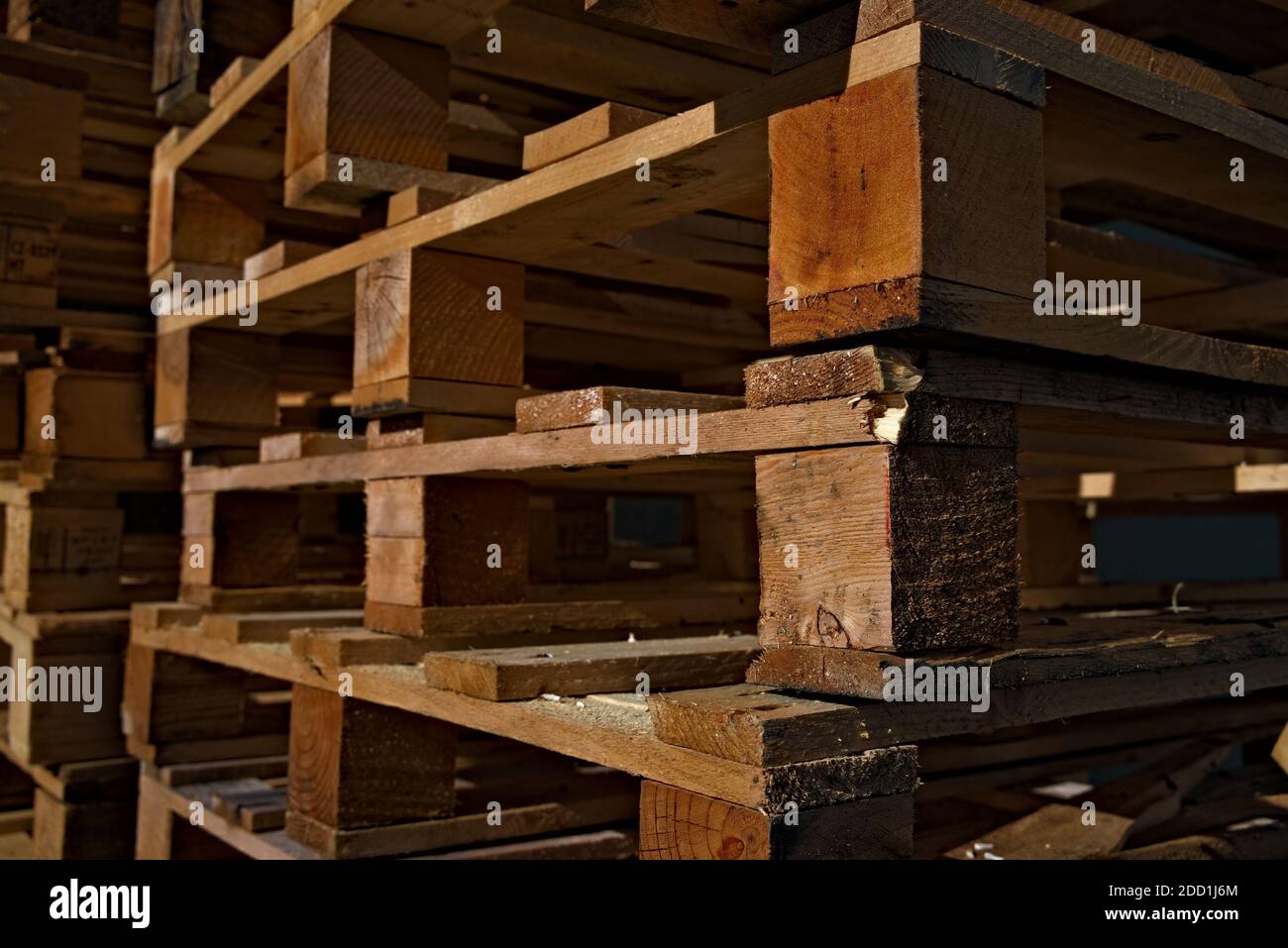 Wooden pallets stacked on top of each other. Close-up Stock Photo - Alamy