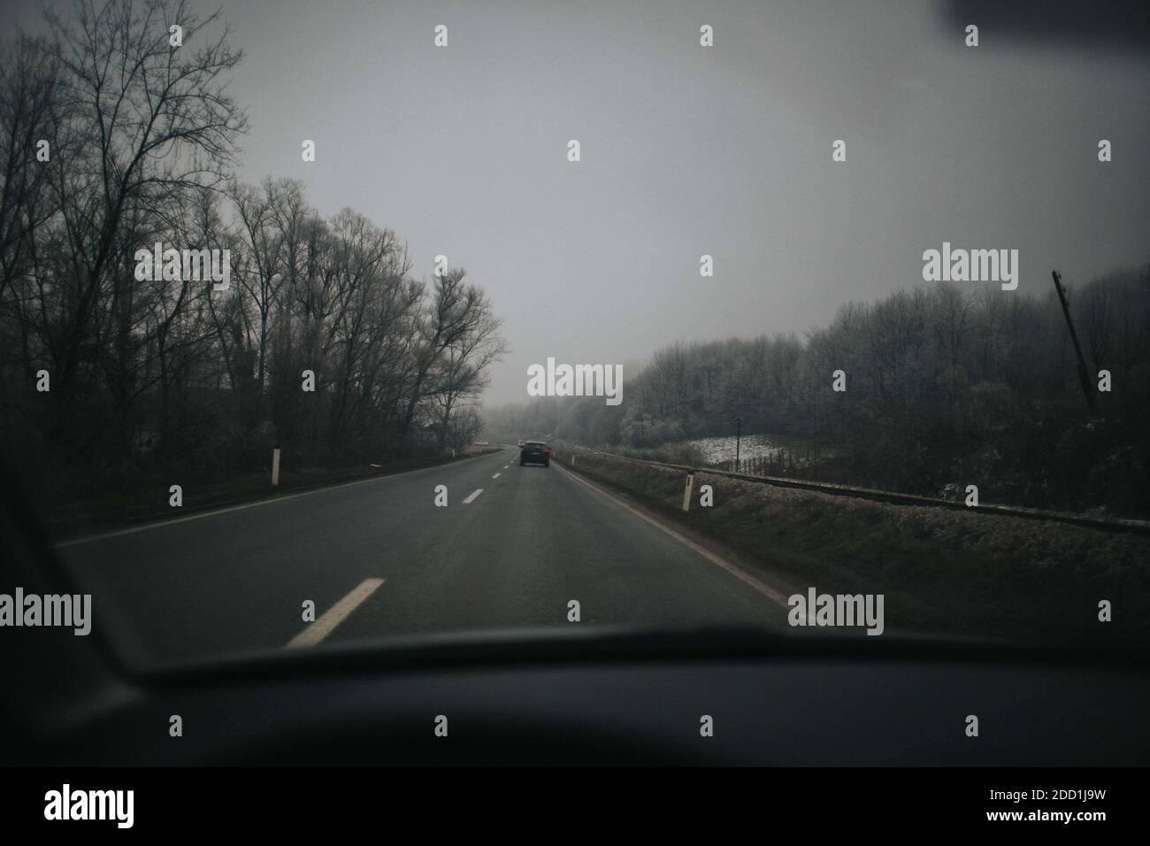 a view of the road from a car windshield Stock Photo - Alamy