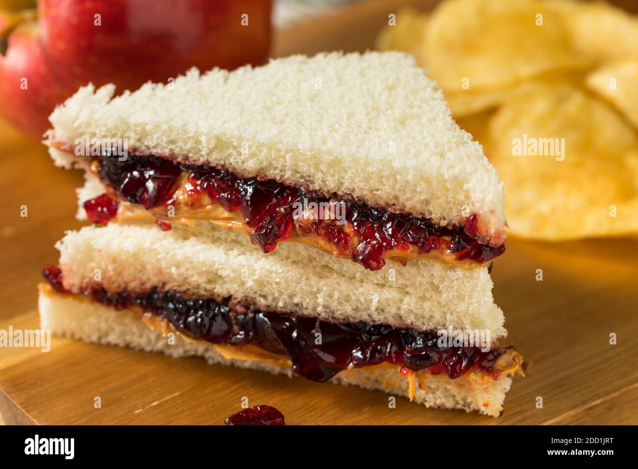Homemade Crustless Peanut Butter and Jelly Sandwich with Chips Stock ...