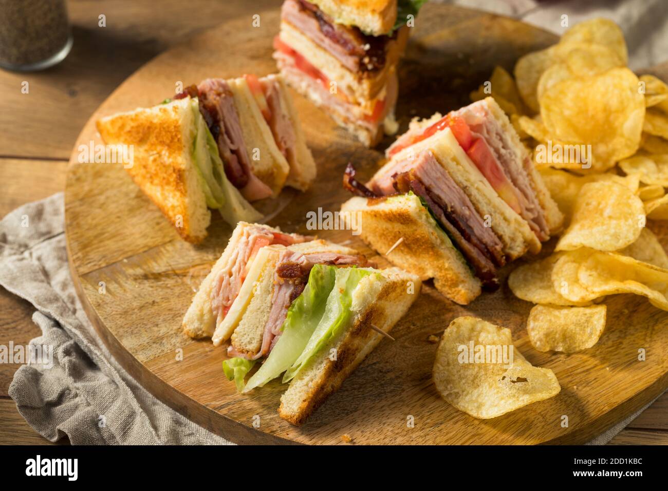 Homemade Turkey Club Sandwich with Bacon Ham and Tomato Stock Photo - Alamy