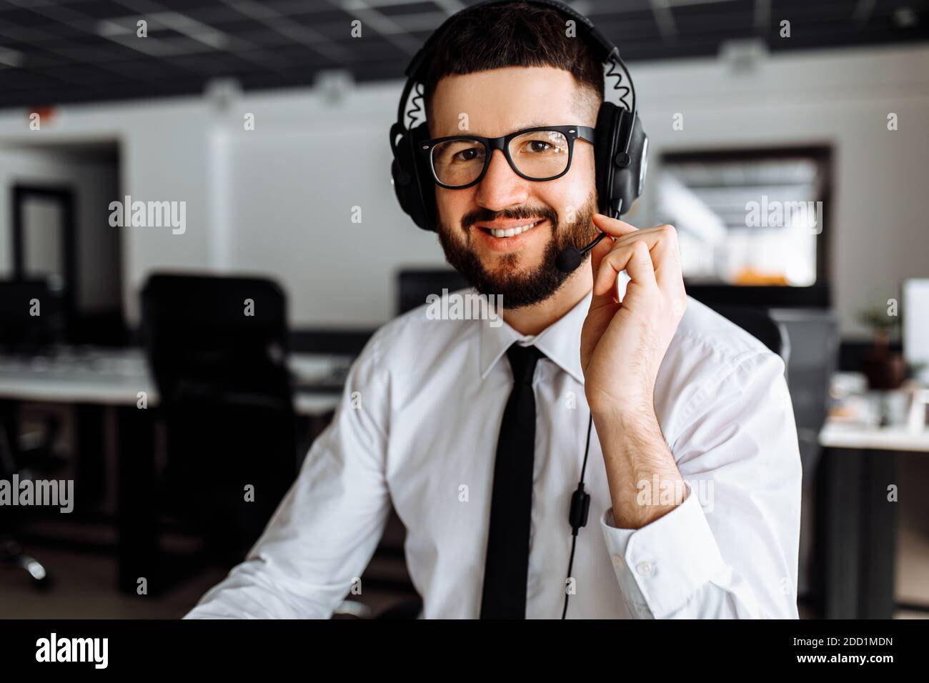 business friendly young male call center operator Stock Photo - Alamy