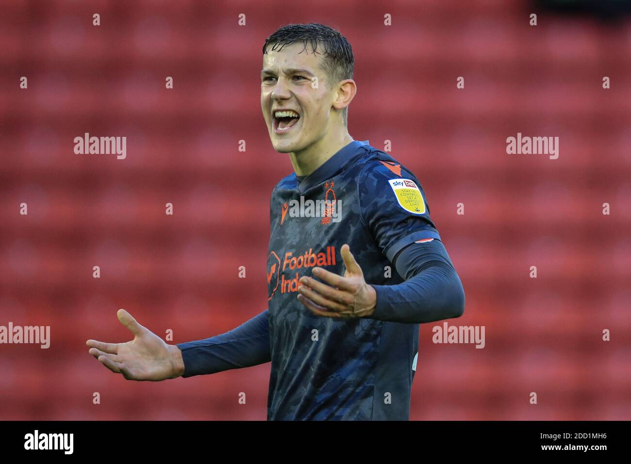 Ryan Yates #22 of Nottingham Forest reacts to referee Andy Woolmer ...