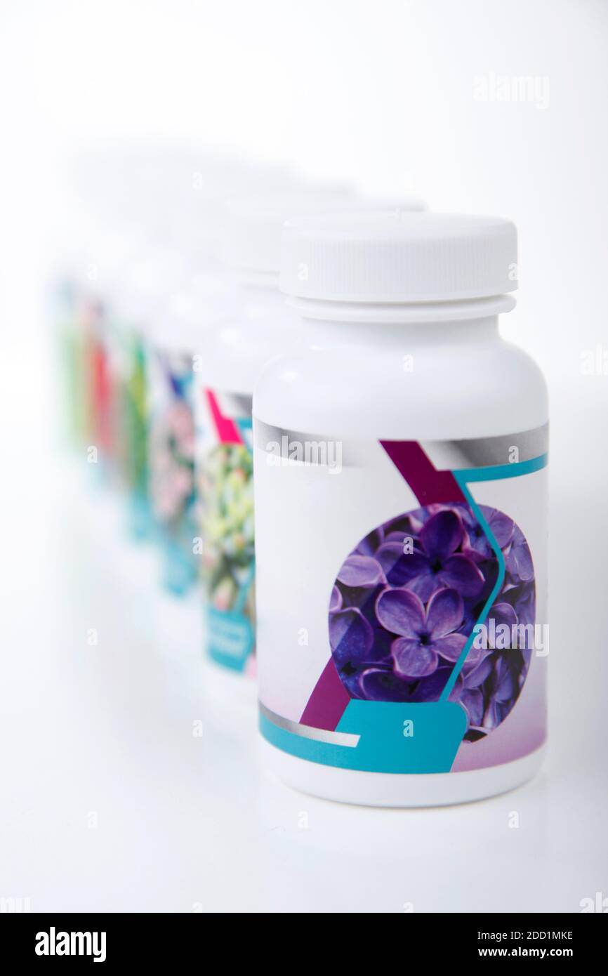 Plant fertilizer bottles isolated on white background Stock Photo - Alamy