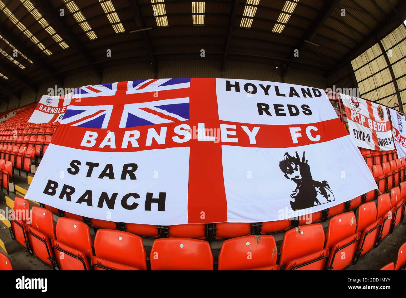 Barnsley flags strewn across the Ponty End stand at Oakwell Stock Photo ...